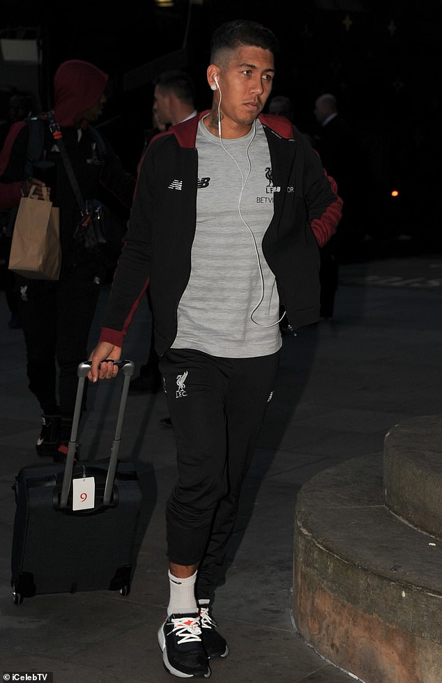 Liverpool players arrive at Lime Street station ahead of Arsenal clash ...