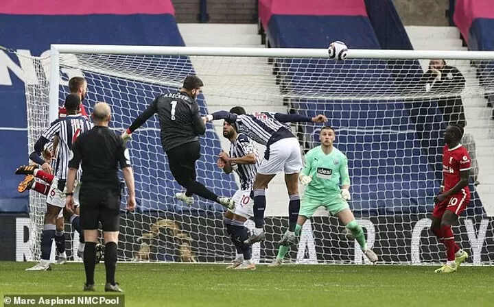 alisson header reaction