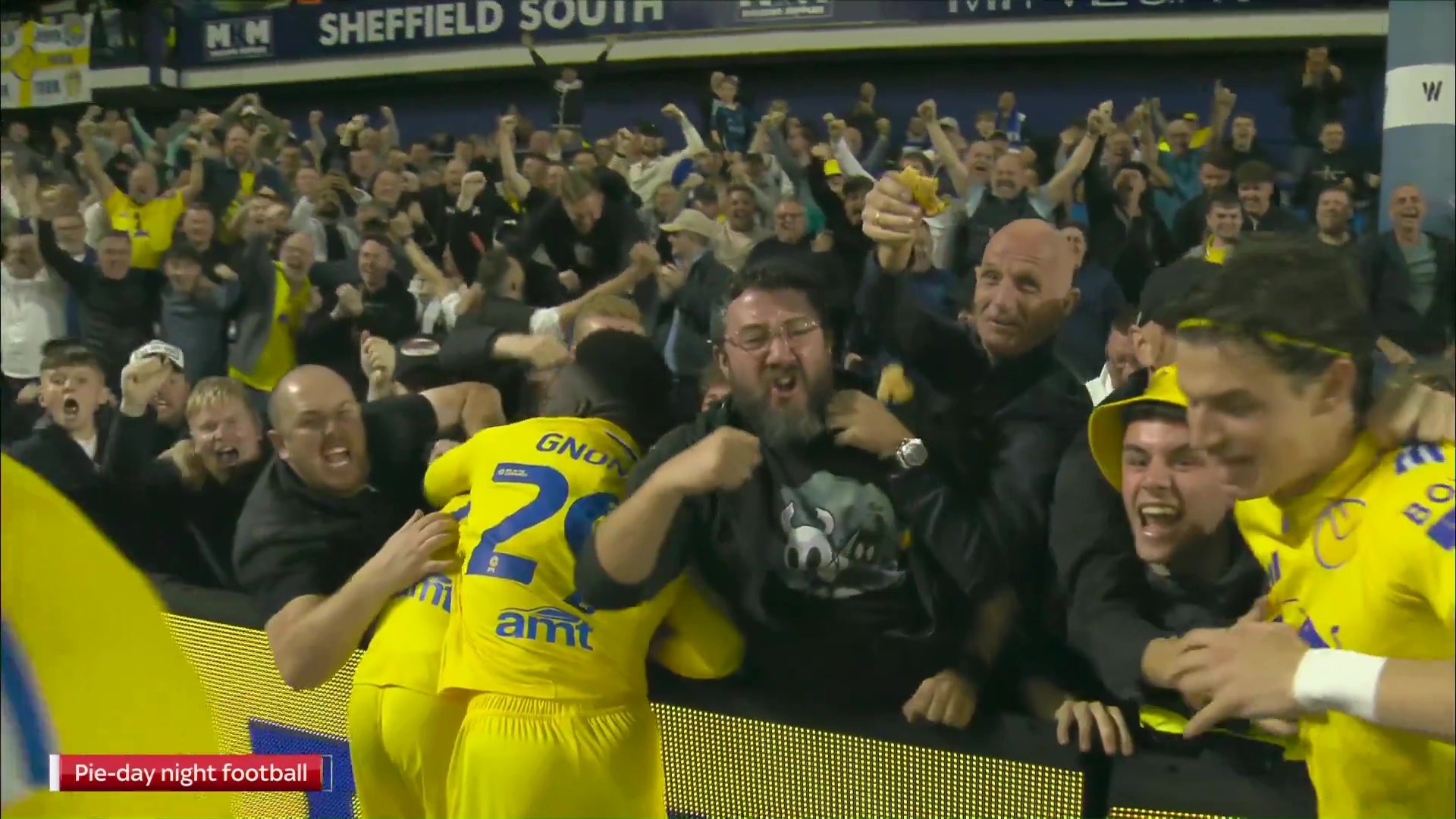 Watch Leeds fan fall through advertising hoarding while scoffing a pie ...